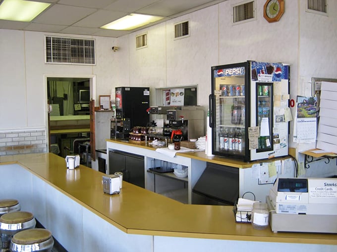 The heart of operations – where coffee flows freely and friendly faces welcome regulars and first-timers with equal warmth.
