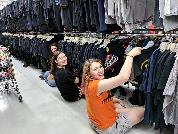 The true thrift store professionals know the best finds lurk at floor level. These dedicated shoppers demonstrate the proper technique for serious bargain hunting.