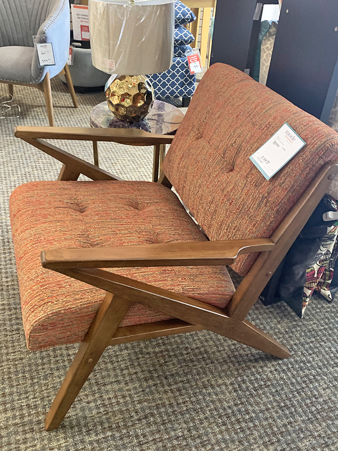 This sassy little number isn't just a chair; it's a time machine to 1960s Palm Springs, martini and sunglasses sold separately.