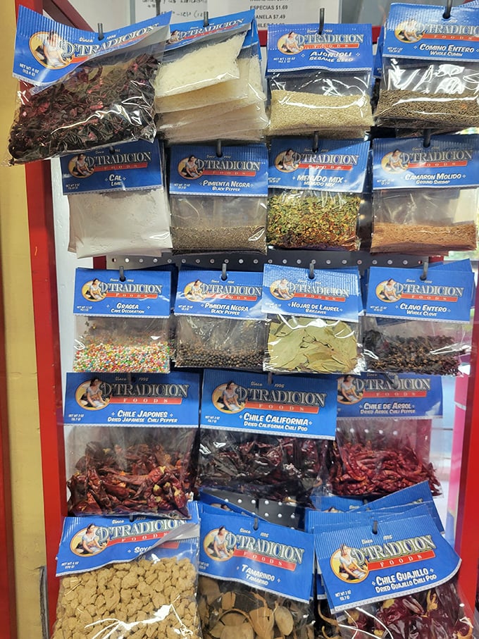 This spice display isn't just ingredients—it's potential. Each packet contains the building blocks of dishes that have been perfected over centuries of Mexican cooking tradition.