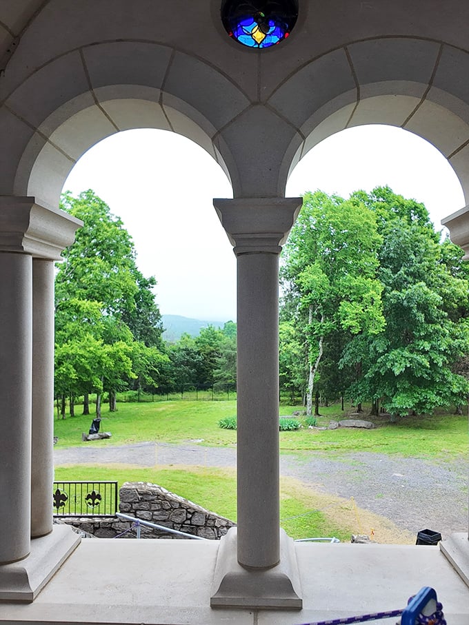 A room with quite a view! These elegant stone arches frame the verdant Tennessee landscape, merging medieval architecture with Southern natural beauty.