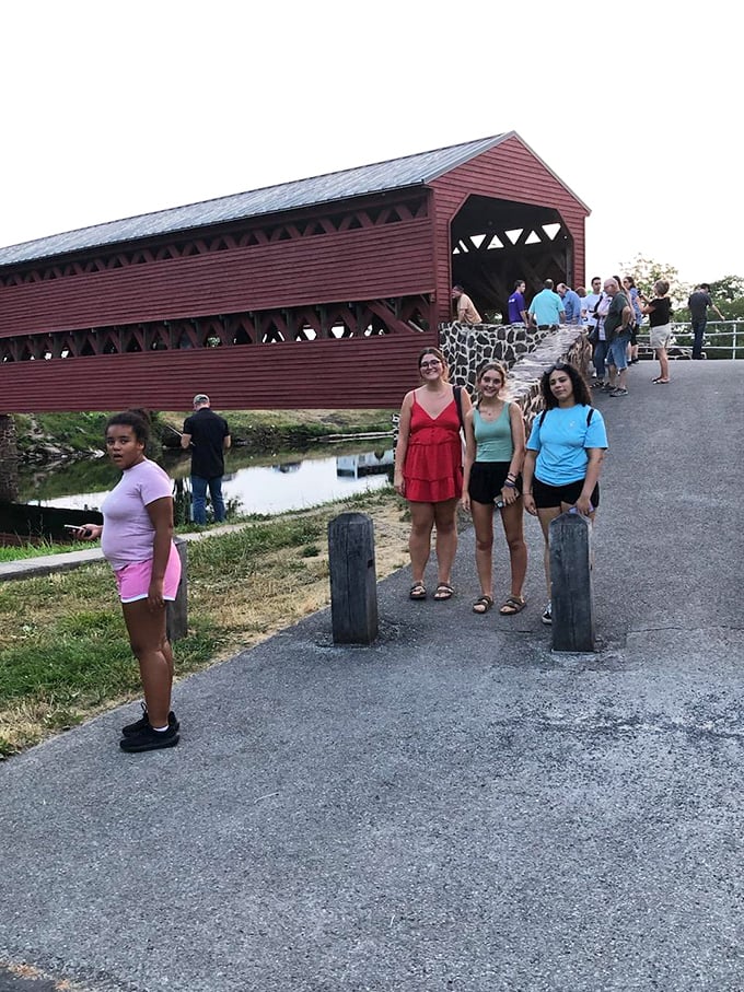 Visitors gather at the entrance, perhaps unaware they're standing where soldiers once marched. Some say the bridge gets more crowded after dark—with spectral guests.
