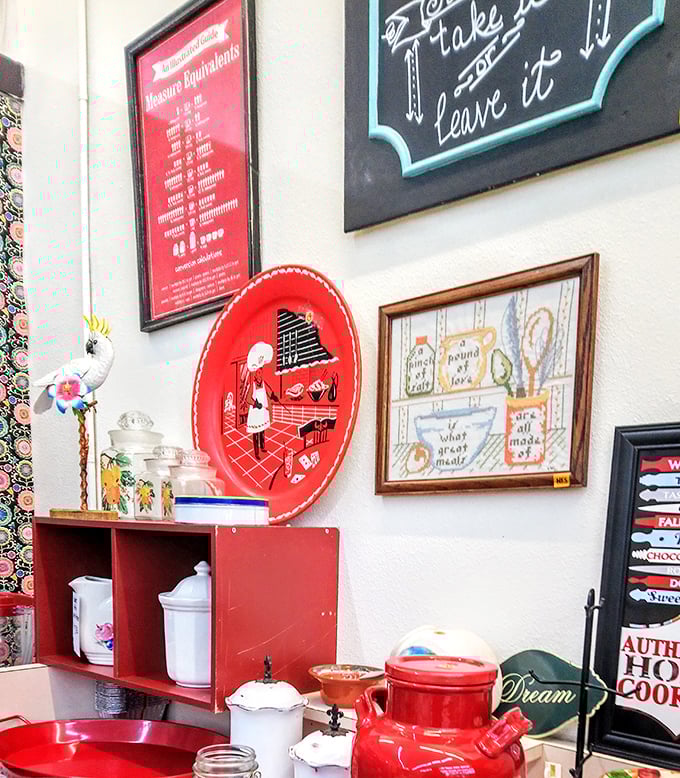 Kitchen wisdom on display. That vintage red tray isn't just decorative—it's a time portal to grandmother's cooking advice.