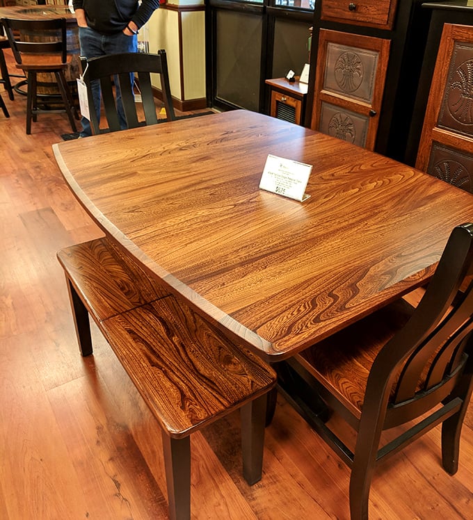 This isn't just a table – it's the surface where some family's Thanksgiving turkey once sat, where homework was completed, where life happened.