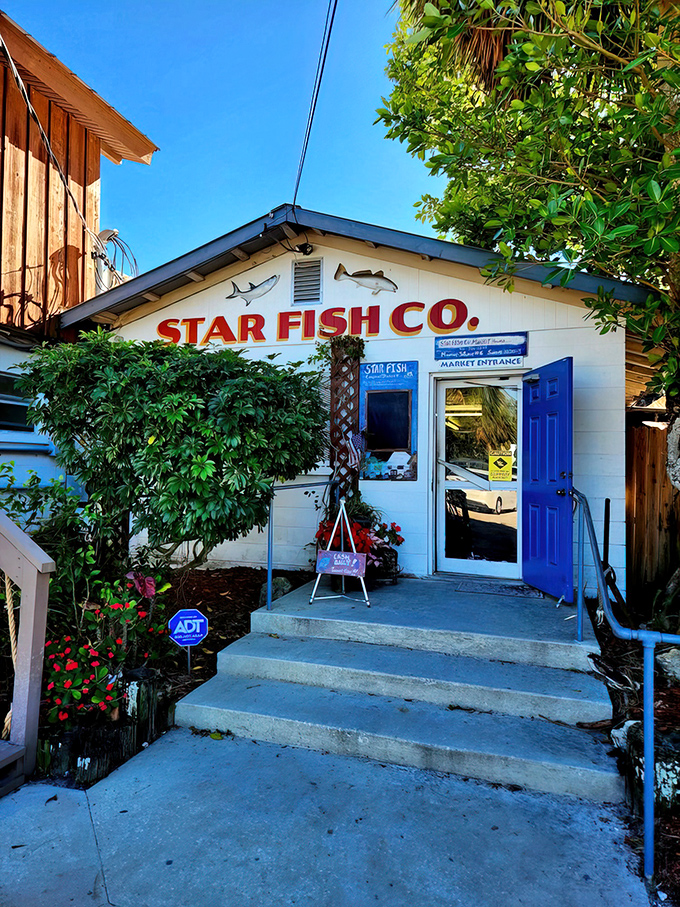 Star Fish Company's cottage-like charm and bright blue door invite you into a world where seafood is religion.