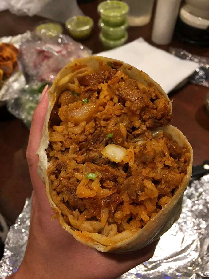 The al pastor burrito: where rice, beans, and that magical spit-roasted pork create a handheld masterpiece worthy of the Louvre.