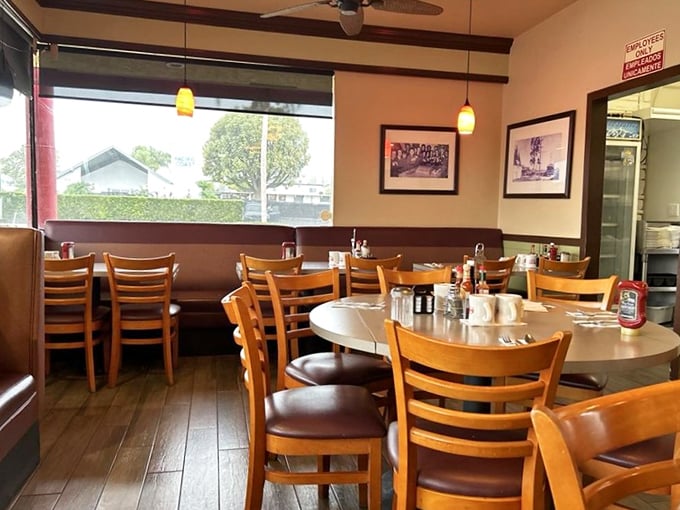 Warm wood tones and comfortable seating create that "everybody knows your name" vibe—minus the alcohol, plus better breakfast options.