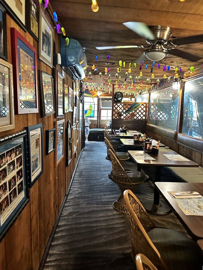 The narrow dining area feels like eating in a beloved fishing boat that somehow sprouted tables, chairs, and colorful lights.