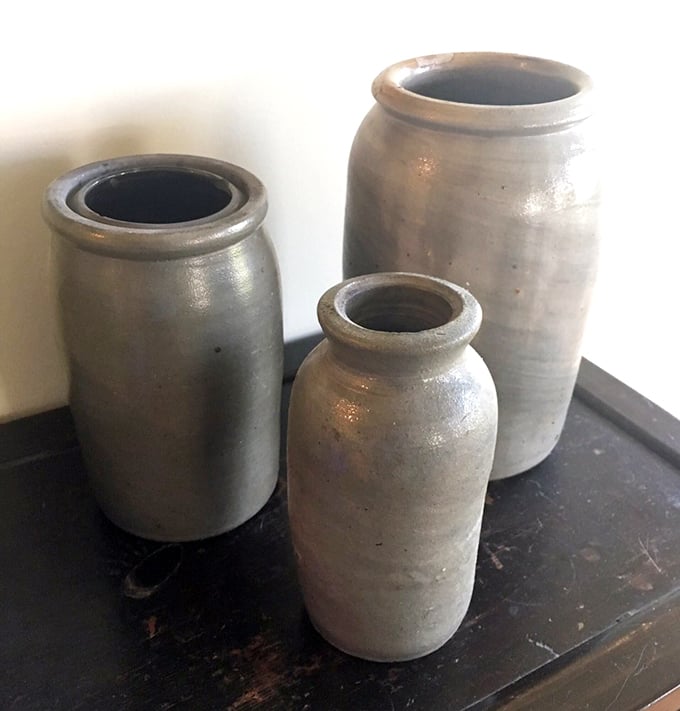 Stoneware vessels that once preserved summer's bounty now preserve history itself. These silent witnesses to countless family kitchens have stories sealed inside.