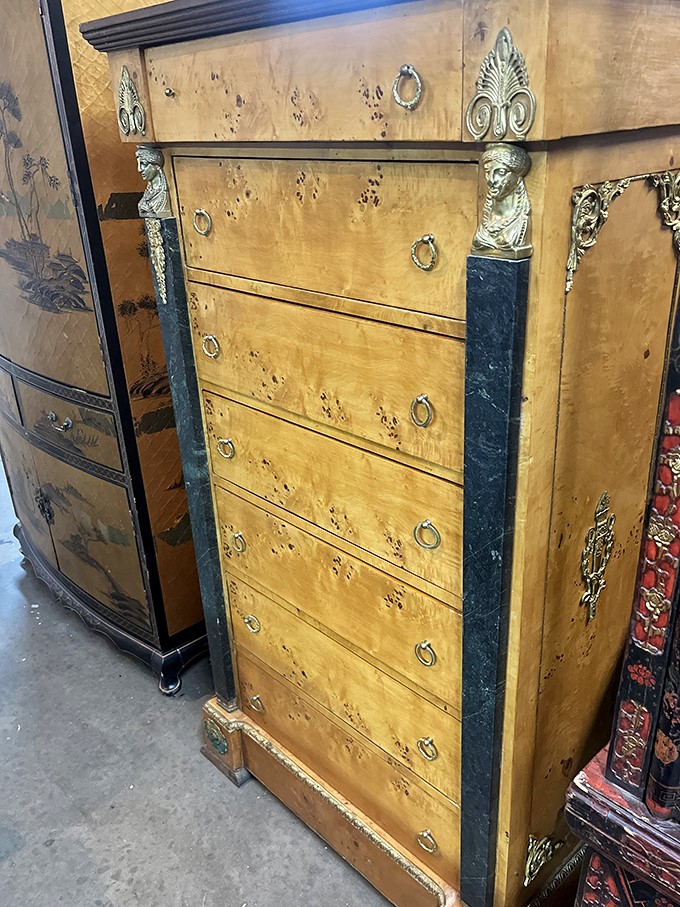 This isn't just a dresser; it's functional art with history in its grain. Antique furniture that makes modern mass-produced pieces look like amateurs.