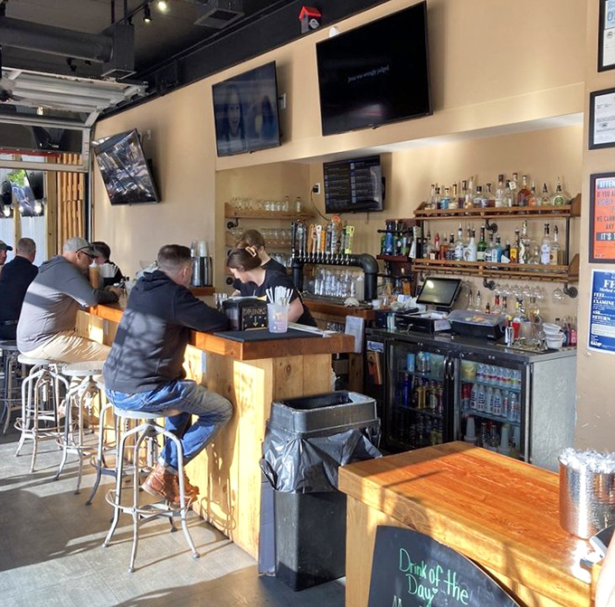 The bar isn't just serving drinks—it's creating the perfect intermission between bites of barbecue brilliance.