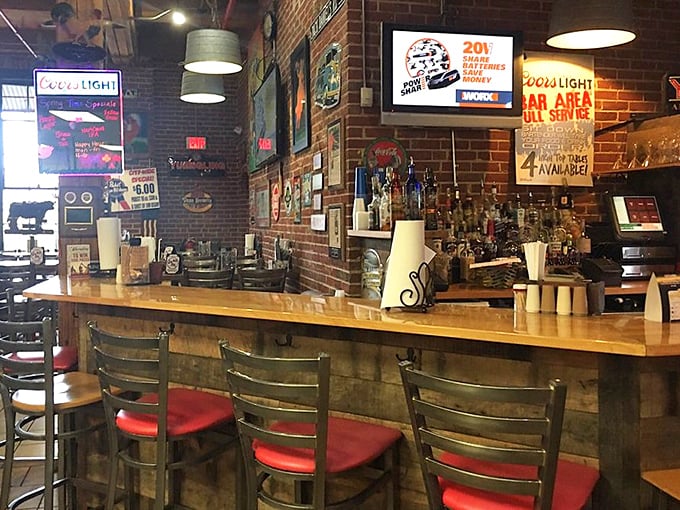 The bar area: where smoked meat meets liquid refreshment in a marriage blessed by the BBQ gods themselves.
