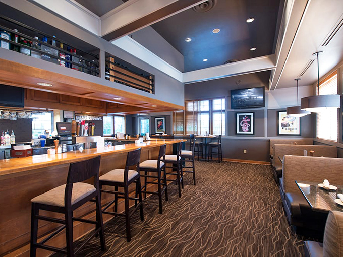 The well-appointed bar area offers the perfect spot for pre-dinner drinks or casual dining with friends and colleagues.