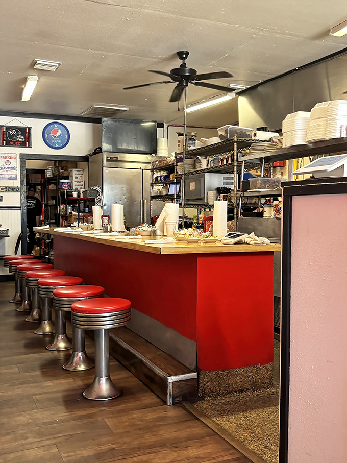 Classic diner stools that have supported generations of hungry Floridians. Not just seating—they're front-row tickets to culinary theater.
