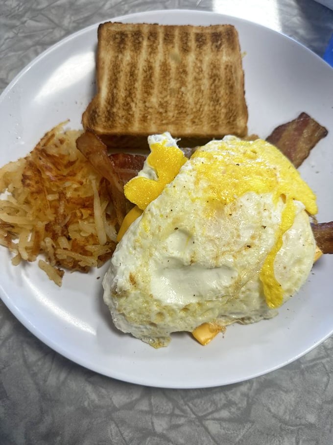 Eggs, toast, hash browns—the breakfast trifecta that's launched a million productive days. Simple perfection is the hardest kind to achieve.