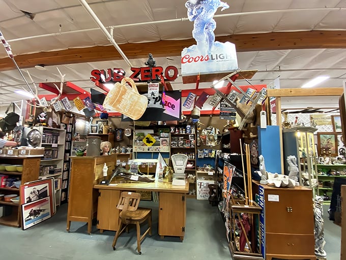 This booth is a maximalist's dream—where vintage lamps, glassware, and furniture create a three-dimensional collage of American design history.