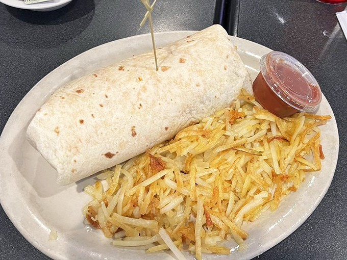 This breakfast burrito doesn't need a passport to deliver happiness—just a side of those perfectly crisped hash browns and maybe a nap afterward.