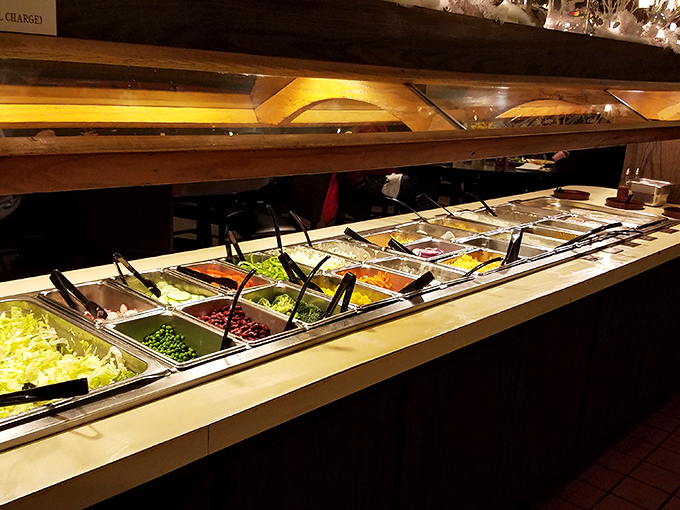 The legendary salad bar in all its glory—a rainbow of fresh ingredients waiting to be assembled into your personal masterpiece.
