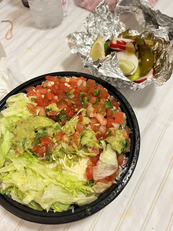 A bowl of freshness that puts sad desk salads to shame. The guacamole-to-pico ratio here deserves a mathematical theorem named after it.