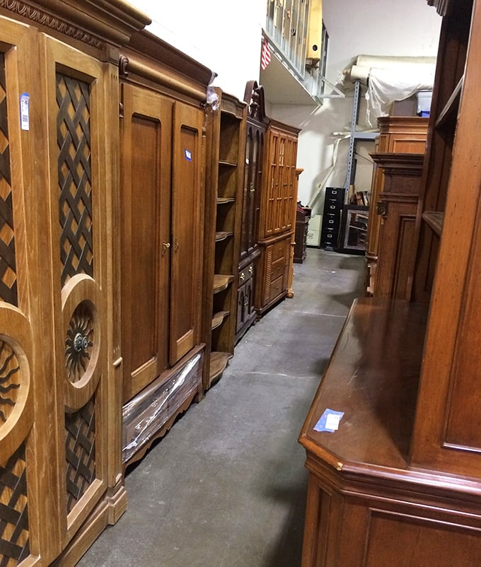 Wooden cabinet corridor showcasing craftsmanship from eras when furniture was built to last generations. These aren't just storage—they're time machines.