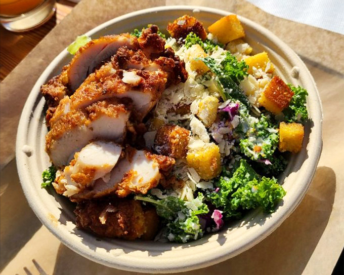 Not your average Caesar—this bowl brings together crispy chicken and fresh greens in a harmony that would make Julius himself weep with joy.