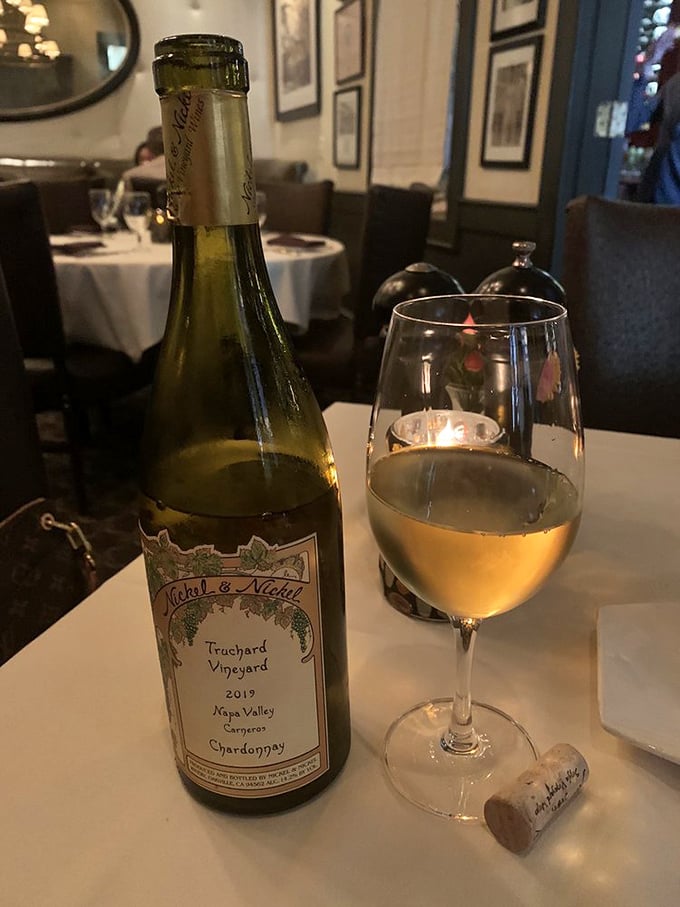 A glass of Nickel & Nickel Chardonnay awaits its moment to shine alongside your steak – the beginning of a perfect gastronomic friendship.