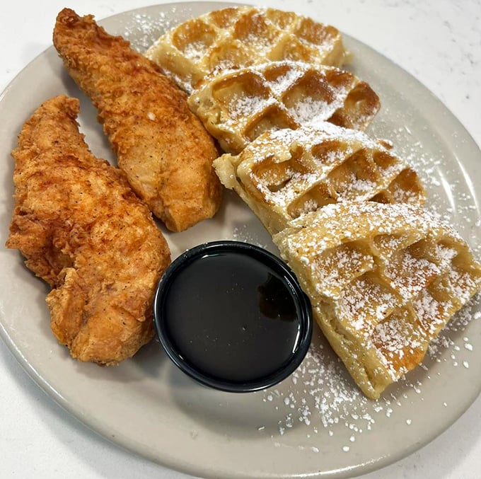 Chicken and waffles – that perfect marriage of crispy and sweet that makes you wonder why we ever separated breakfast from dinner in the first place.