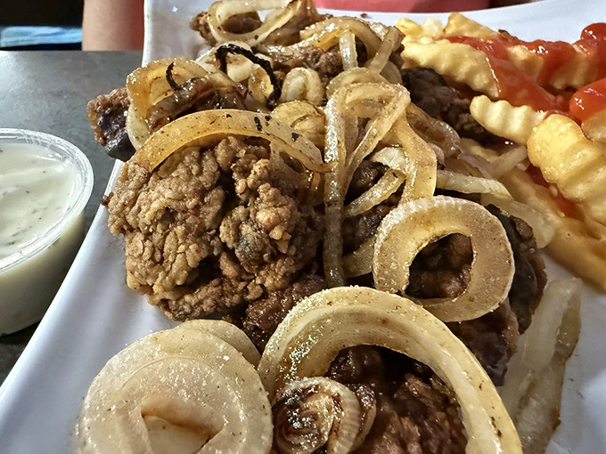 Chicken livers and onions—the dish that separates casual diners from true food adventurers. Rich, earthy, and unapologetically Southern.