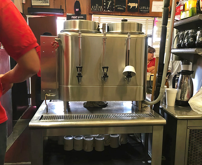 The coffee station isn't designed for Instagram—it's engineered for efficiency, because when people need caffeine, they don't want to wait for artisanal foam art.