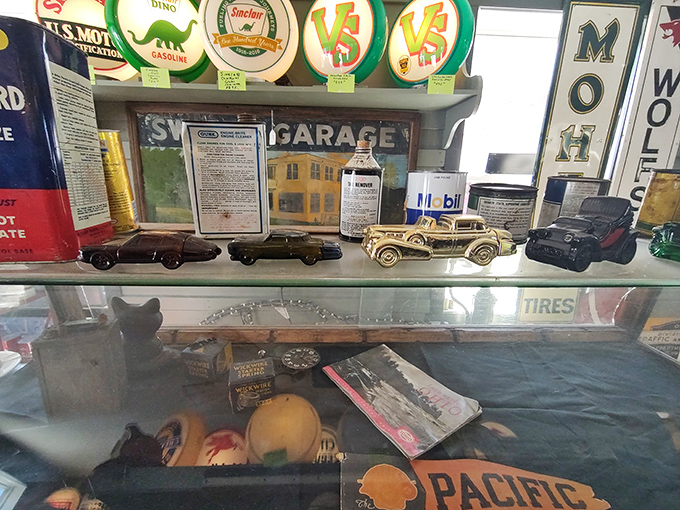 Miniature automotive history behind glass. Each model car represents someone's dream ride from an era when chrome was king.