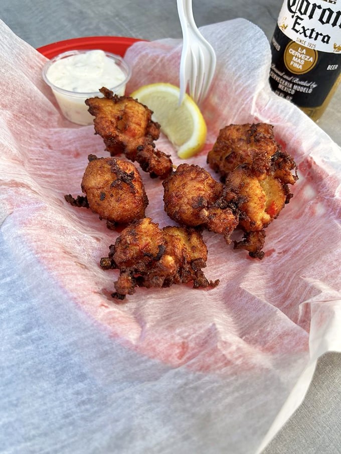 Conch fritters—little hush puppies of the sea that deliver a taste of the Caribbean with every bite. Worth every calorie and then some.