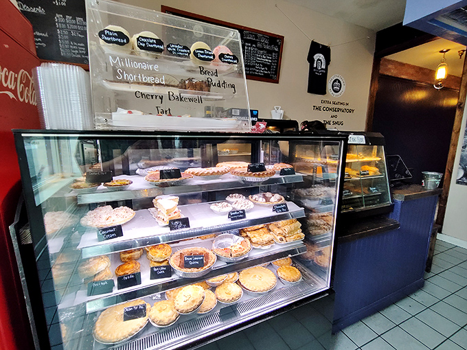 The display case – where dreams are made, diets go to die, and indecision becomes an art form.