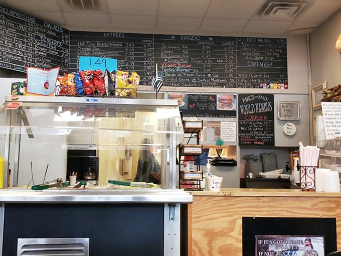 The ordering counter—where dreams are spoken aloud and transformed into edible reality. That menu board has witnessed countless moments of hunger-induced indecision.