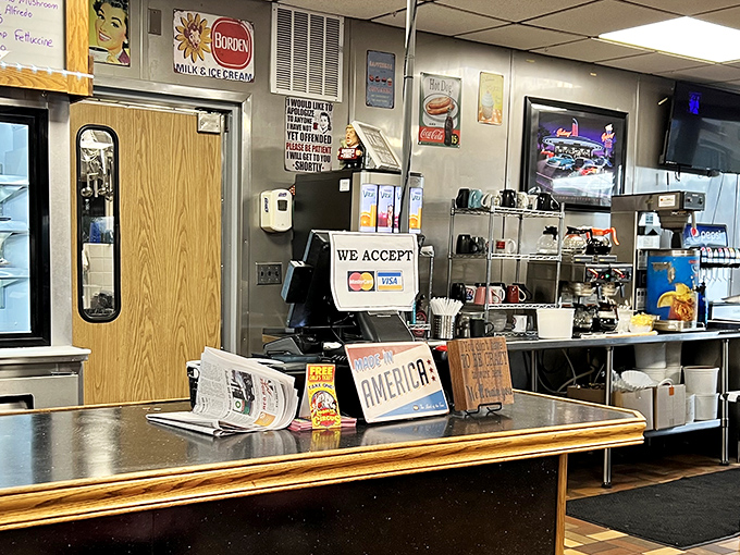 The counter—where diner magic happens. Fresh-baked goods tempt you while you pretend to consider ordering something sensible.