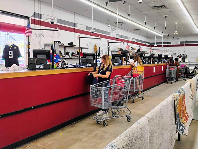 The checkout: final gateway between browsing and ownership. Those red counters have witnessed countless "You won't believe what I found for just…" conversations.