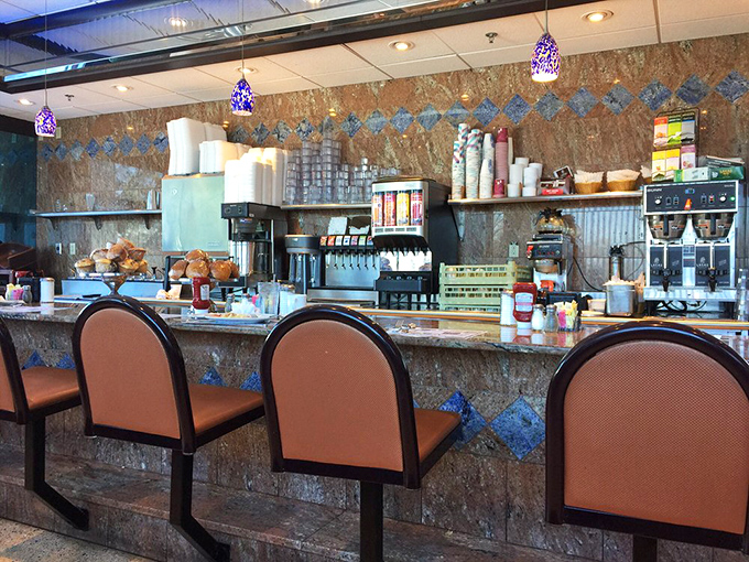 The counter seating offers front-row tickets to the culinary show, where coffee flows as freely as conversation.