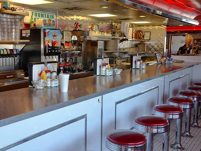 The counter seats aren't just places to eat—they're front-row tickets to the culinary theater where breakfast dreams come true.