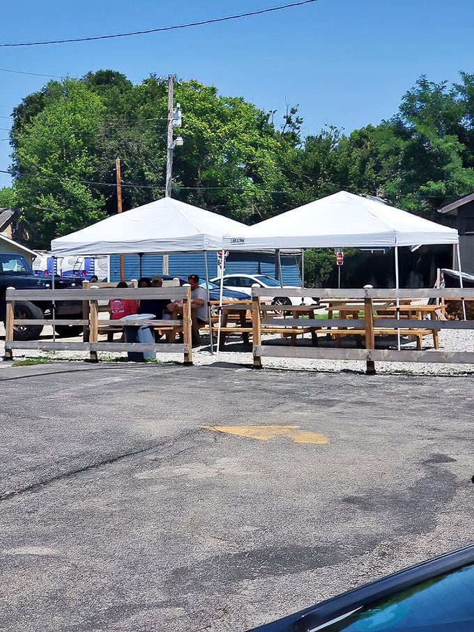 When Indiana summer days cooperate, these tented tables become the best seats in Westfield—informal dining halls where sauce-stained fingers are badges of honor.