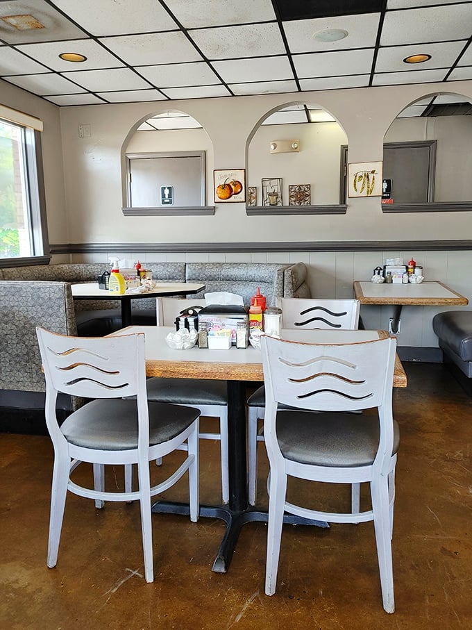 Route 66 memorabilia and warm lighting create an atmosphere that feels like America's favorite dining room.