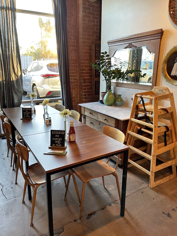 The vintage dresser and high chair in the corner aren't just decoration—they're conversation starters while you wait for your food.