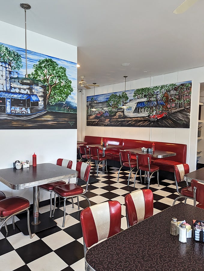 Vintage-style murals celebrate Carl's place in the community, watching over diners who've made this their second kitchen for decades.