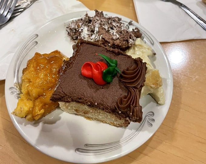 A dessert plate that tells the story of someone who wisely saved room, featuring chocolate cake that deserves its own Instagram account.