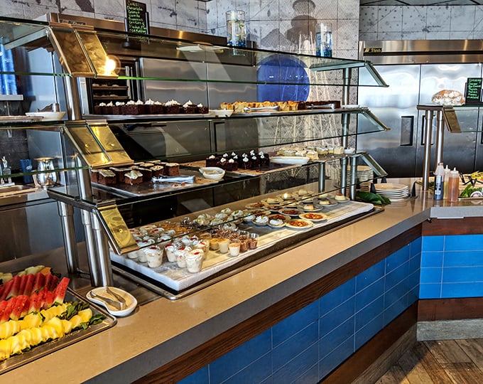 The dessert display – where willpower goes to die after you've already promised yourself "just one more crab leg."