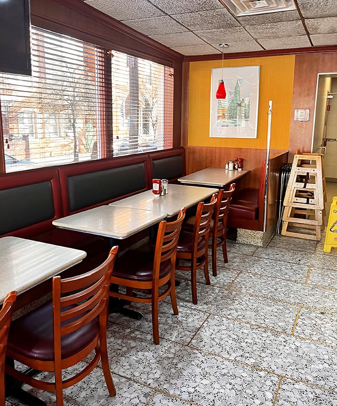 Window booths: prime real estate for people-watching with your pancakes. Natural light makes everything—including your breakfast companions—look better.