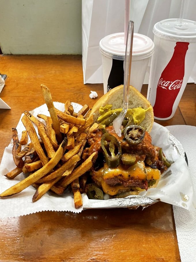 Jalapeños standing guard over a fortress of beef and cheese. This spicy creation demands respect and delivers satisfaction in equal measure.