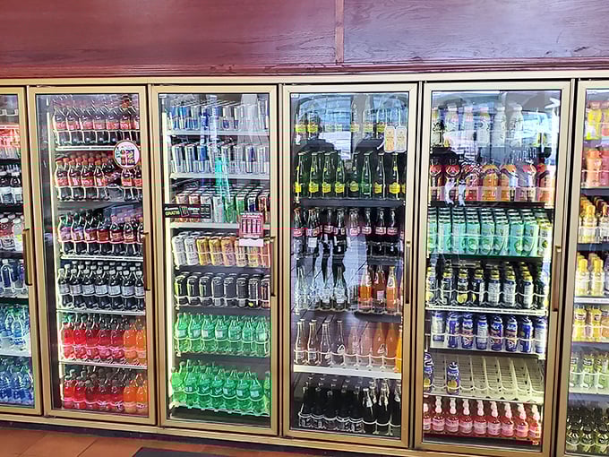 A rainbow of refreshment options standing at attention. After spicy tacos, these cold beverages become more than drinks—they're liquid salvation.