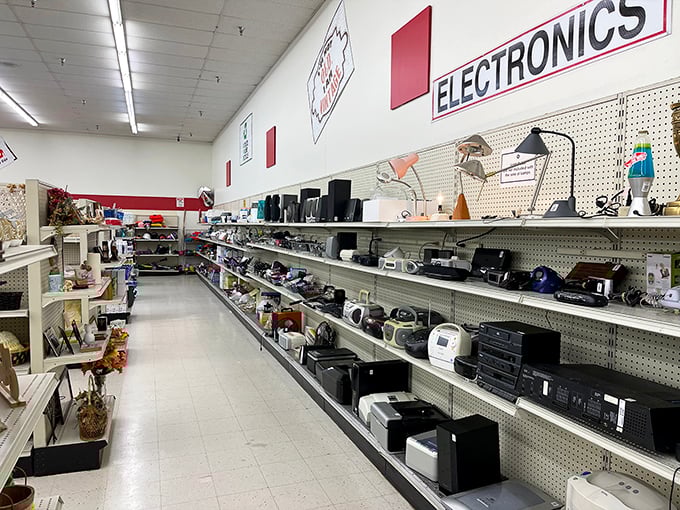 The electronics aisle: a museum of technological evolution where yesterday's cutting-edge gadgets await nostalgic new owners.