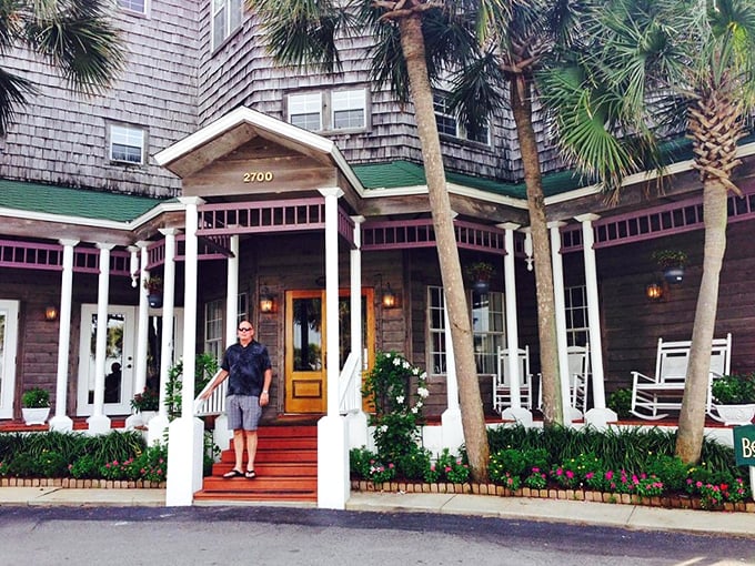 The welcoming porch entrance feels like arriving at a friend's beach house—if your friend happened to be an award-winning chef with waterfront property.