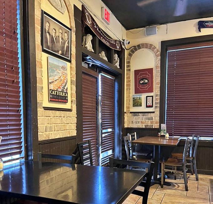 Rustic brick walls and carefully chosen artwork create an atmosphere that feels both timeless and welcoming—like dining in an Italian family's home.