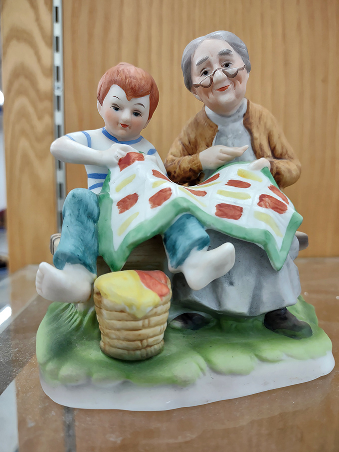 Ceramic figurines share eternal moments, frozen in time like tiny theatrical performances awaiting applause.